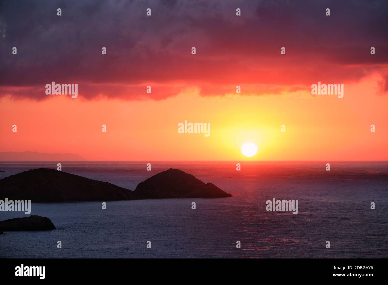 Sea sunset. Seascape sunset with island. Sun setting down in sea. Crete ...