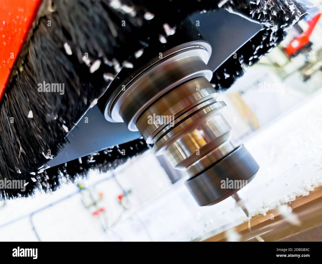 View Of A Cnc Machine Cutting Through A Polyethylene Board In A Plastic