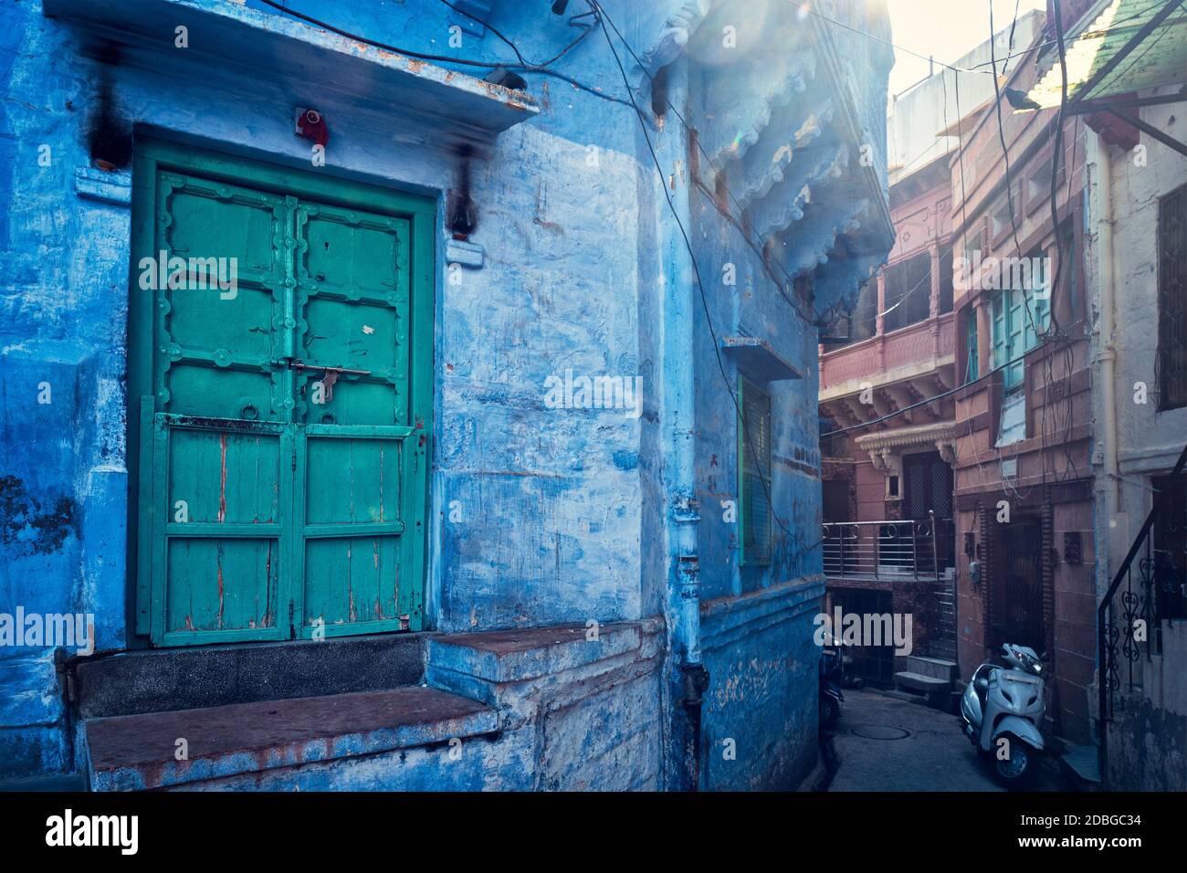 Blue houses in streets of of Jodhpur, also known as "Blue City" due to ...
