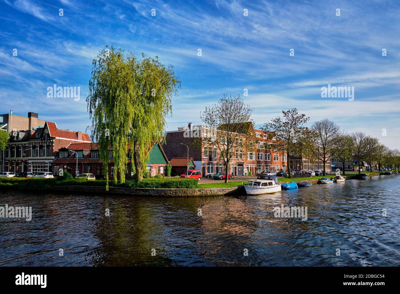 Boats and houses and canal. Harlem, Netherlands Stock Photo - Alamy