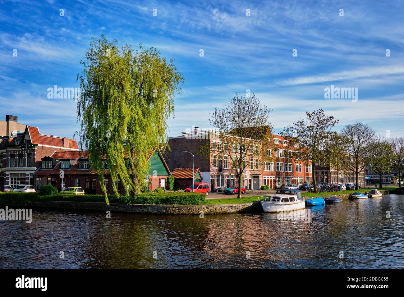 Boats and houses and canal. Harlem, Netherlands Stock Photo - Alamy