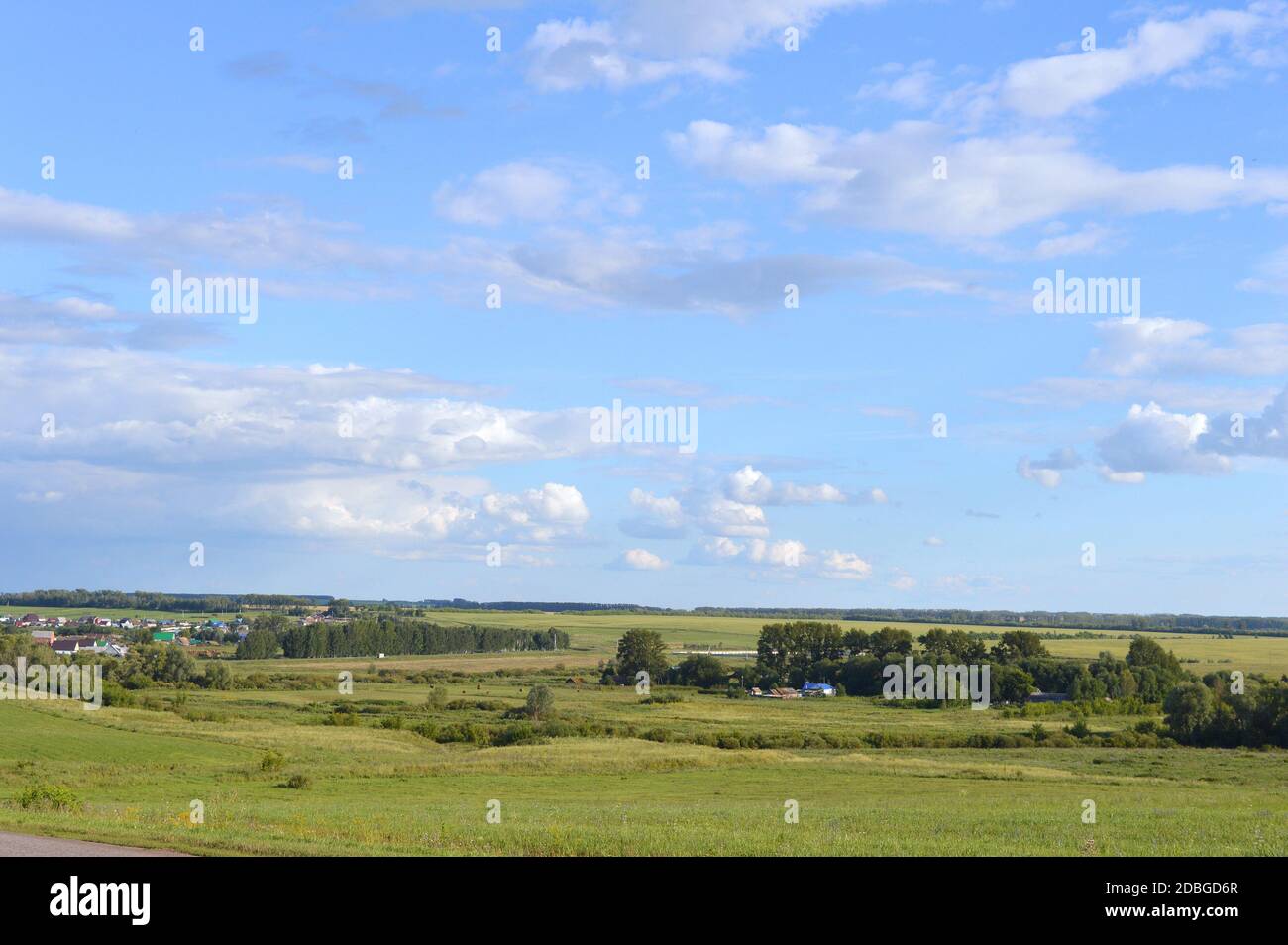 beautiful summer village landscape with sky and clouds Stock Photo - Alamy