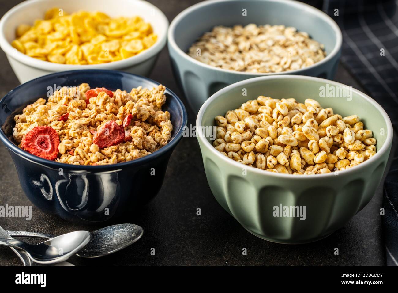 Various breakfast cereals in bowls. Puffed wheat and oatmeals Stock ...