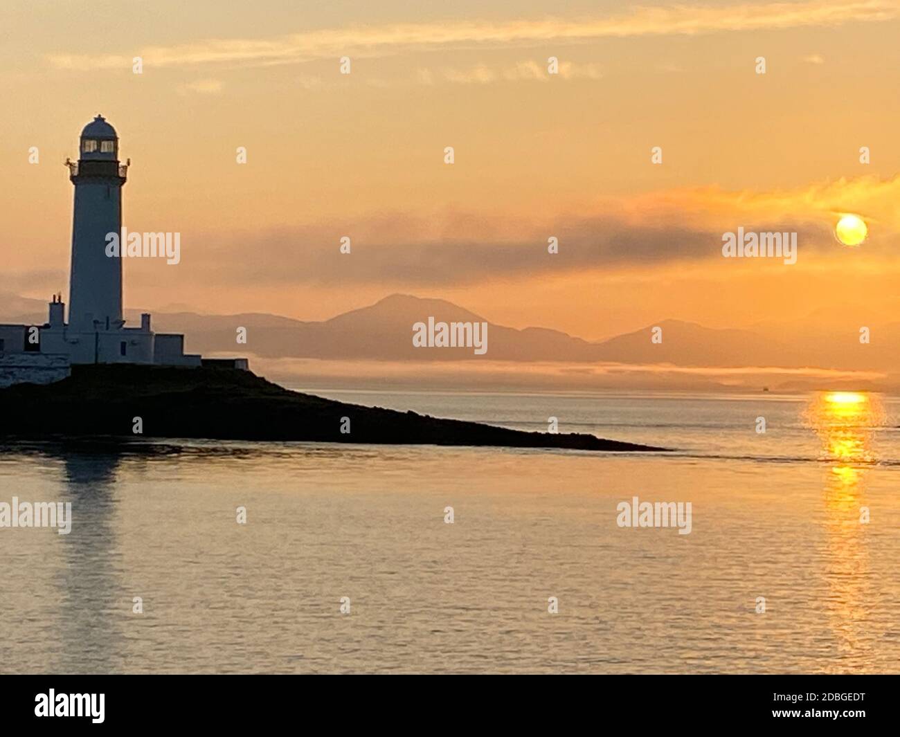 Sunrise over Lismore Lighthouse in the Scottish Hebrides Stock Photo ...