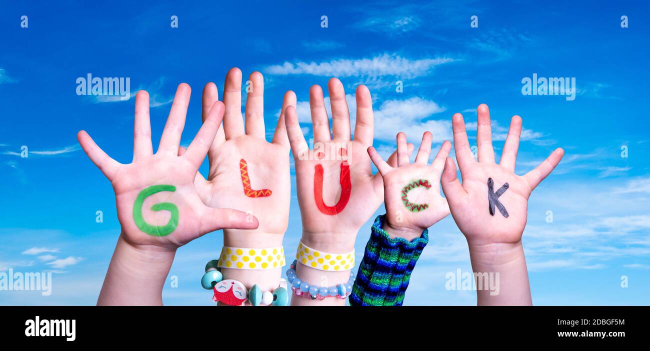 Children Hands Building Colorful German Word Glueck Means Luck. Blue ...