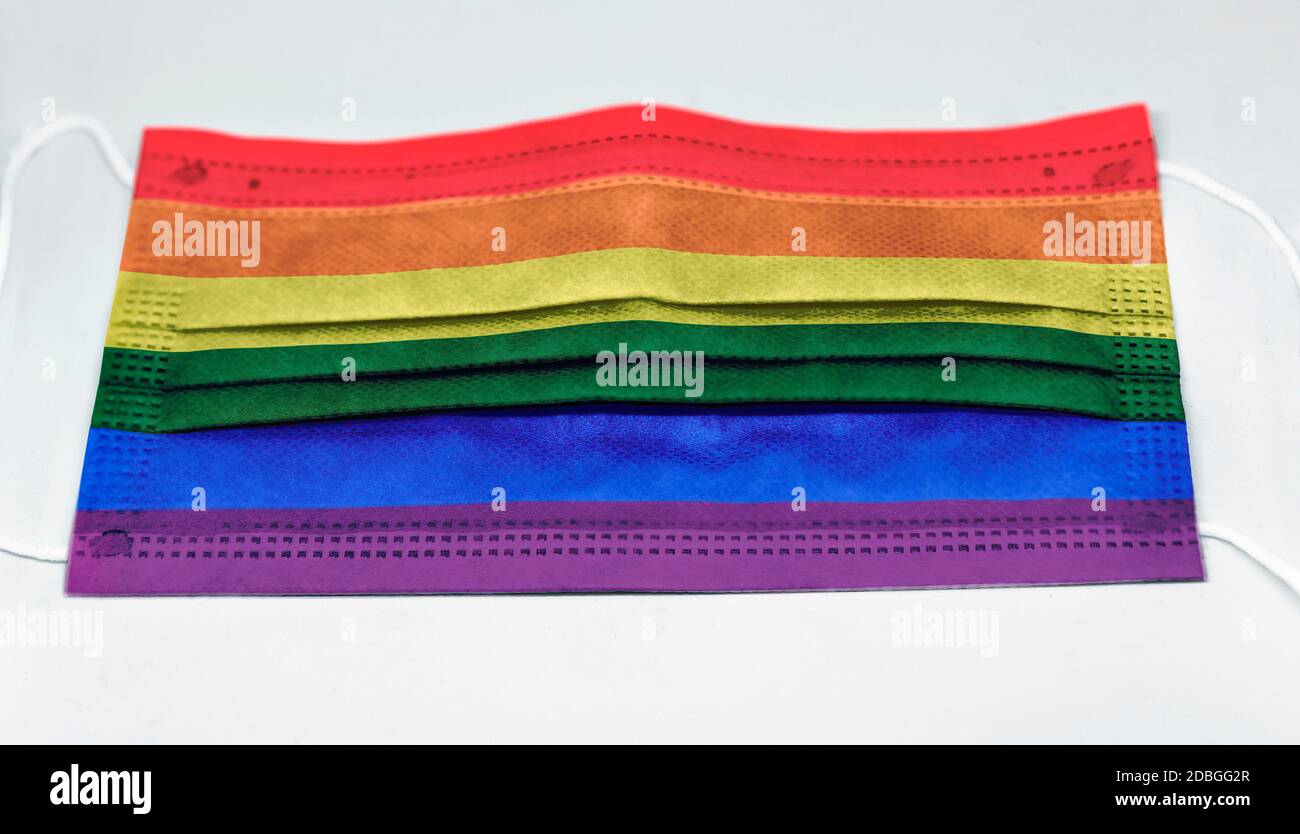 surgical mask with the rainbow flag of gay pride. Pandemic covid-19 and ...