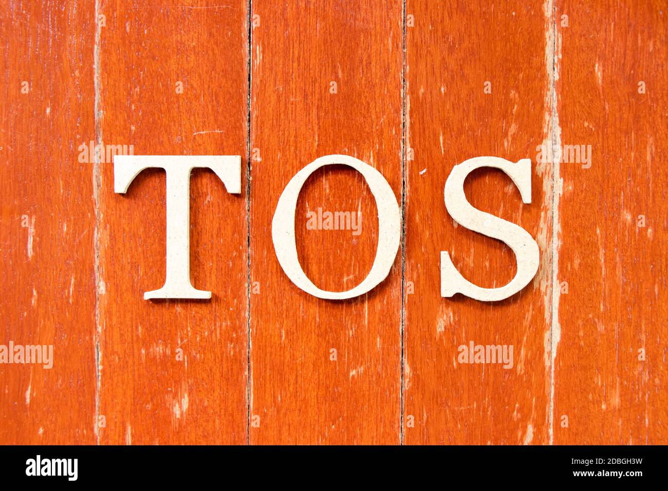 Alphabet letter in word TOS (abbreviation of Terms of service) on old ...