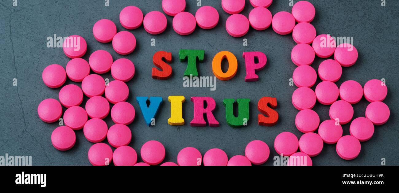 The stop sign consists of multicolored letters in a frame of bright ...