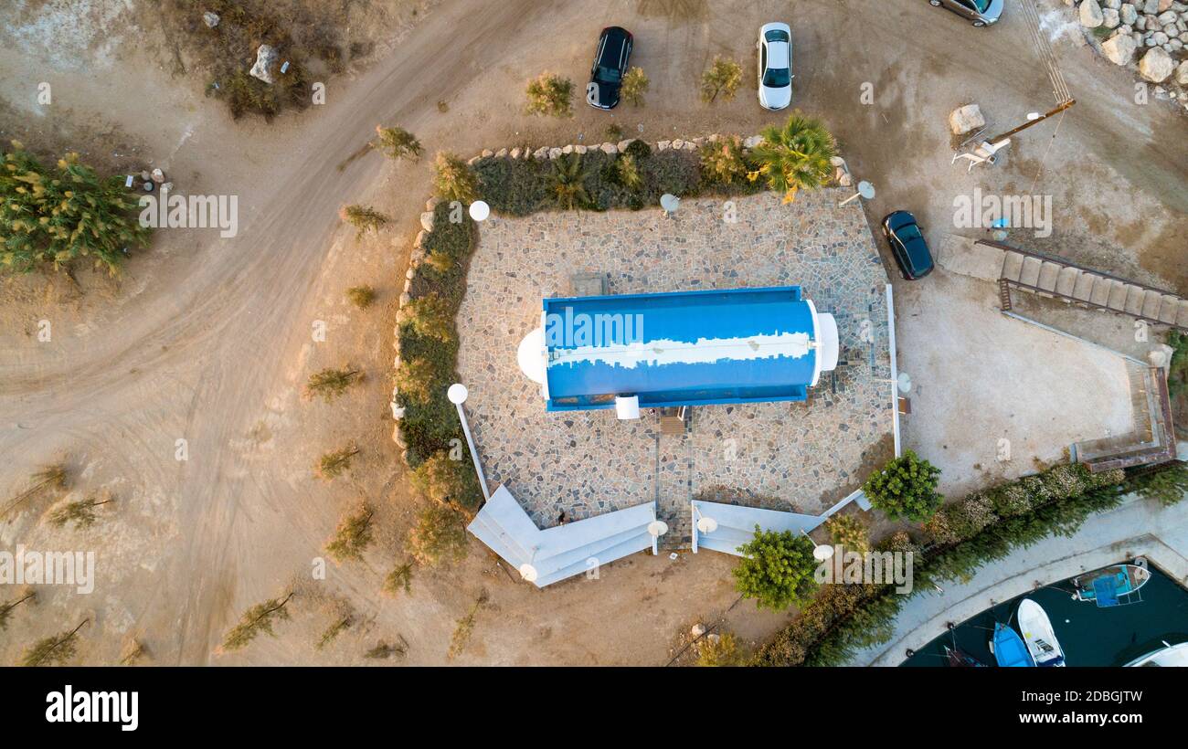 Aerial view of sunset and landmark white washed modern arch chapel of ...