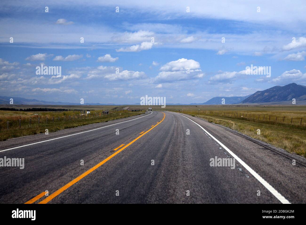 The road and the open valley Stock Photo - Alamy