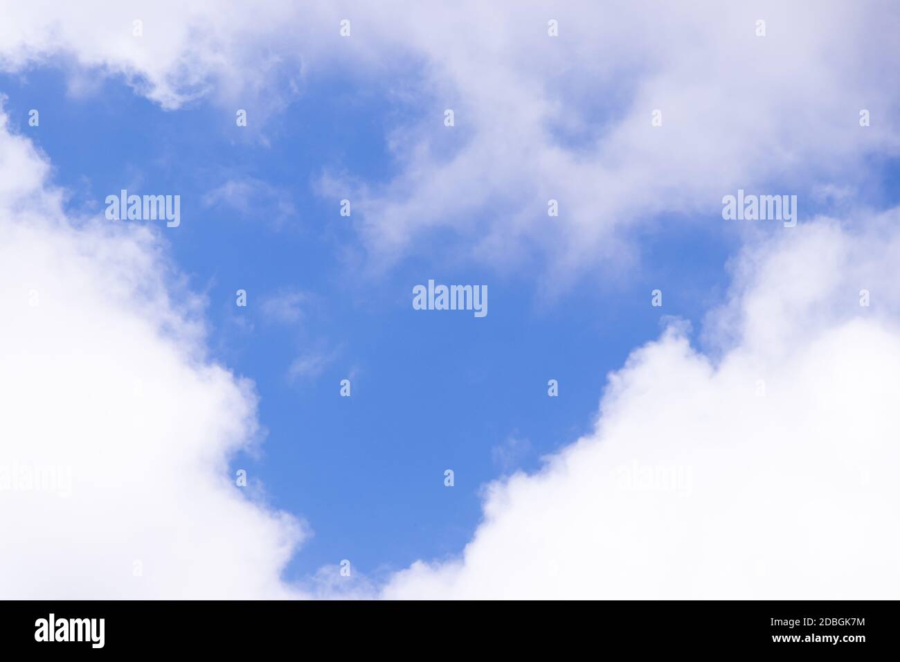 Clear blue color sky with white cloud background Stock Photo - Alamy