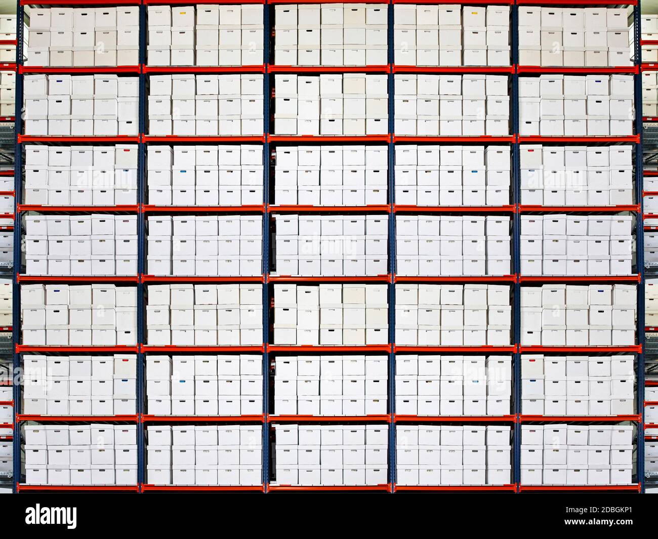 Big shelf with white storage boxes in warehouse Stock Photo - Alamy