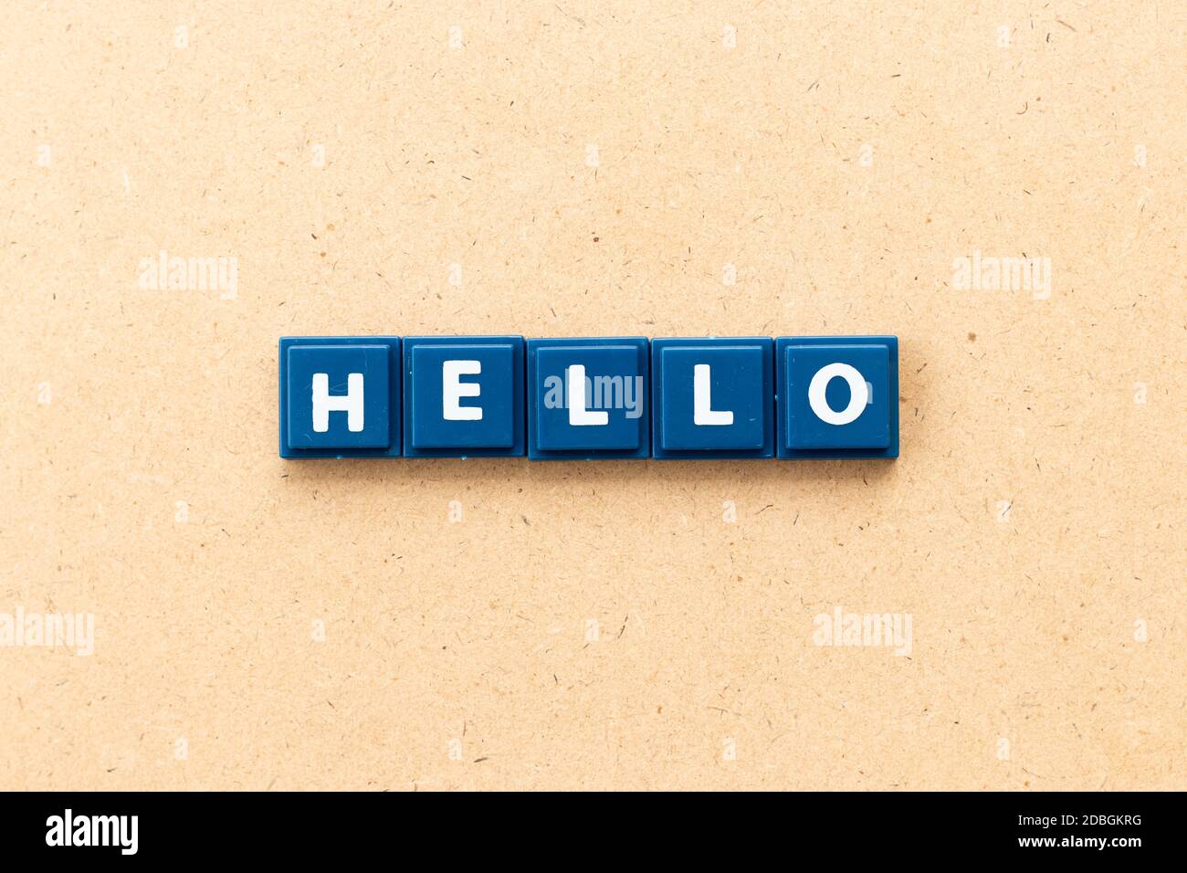Tile letter in word hello on wood background Stock Photo - Alamy