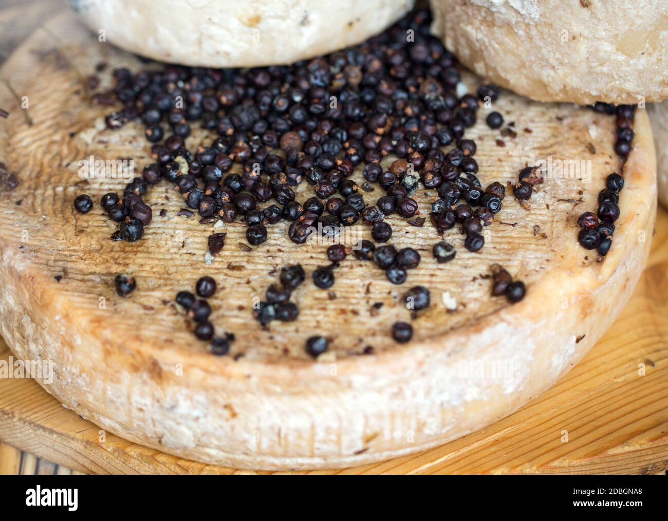 fresh cheeses on sale in the local market stall Stock Photo - Alamy