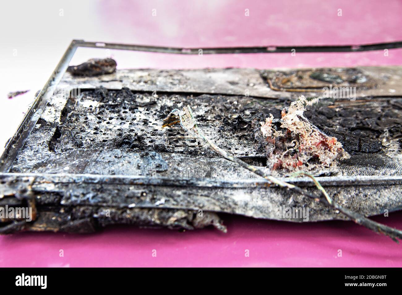 Computer Fire. Broken laptop computer spoiled by flame of hot fire ...