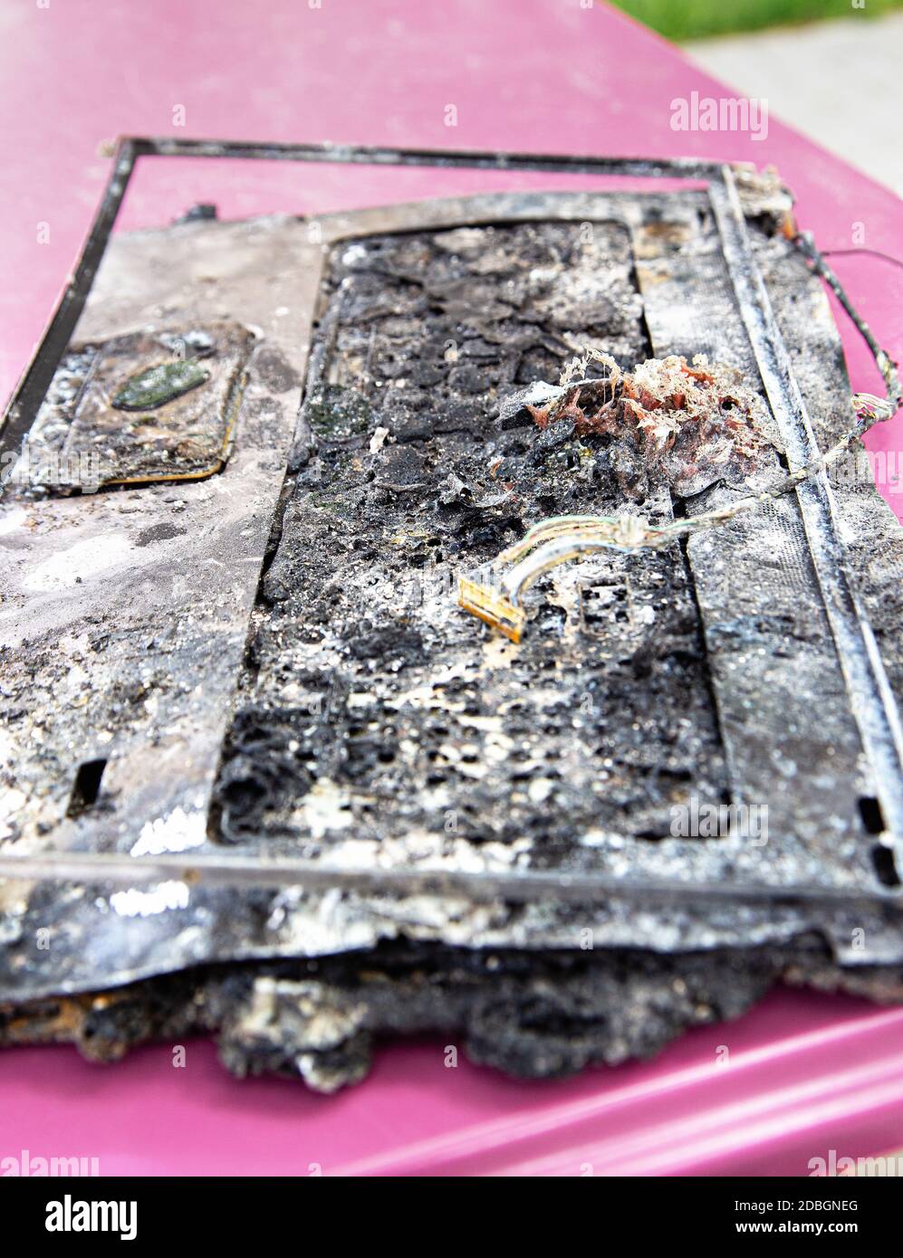 Computer Fire. Broken laptop computer spoiled by flame of hot fire ...