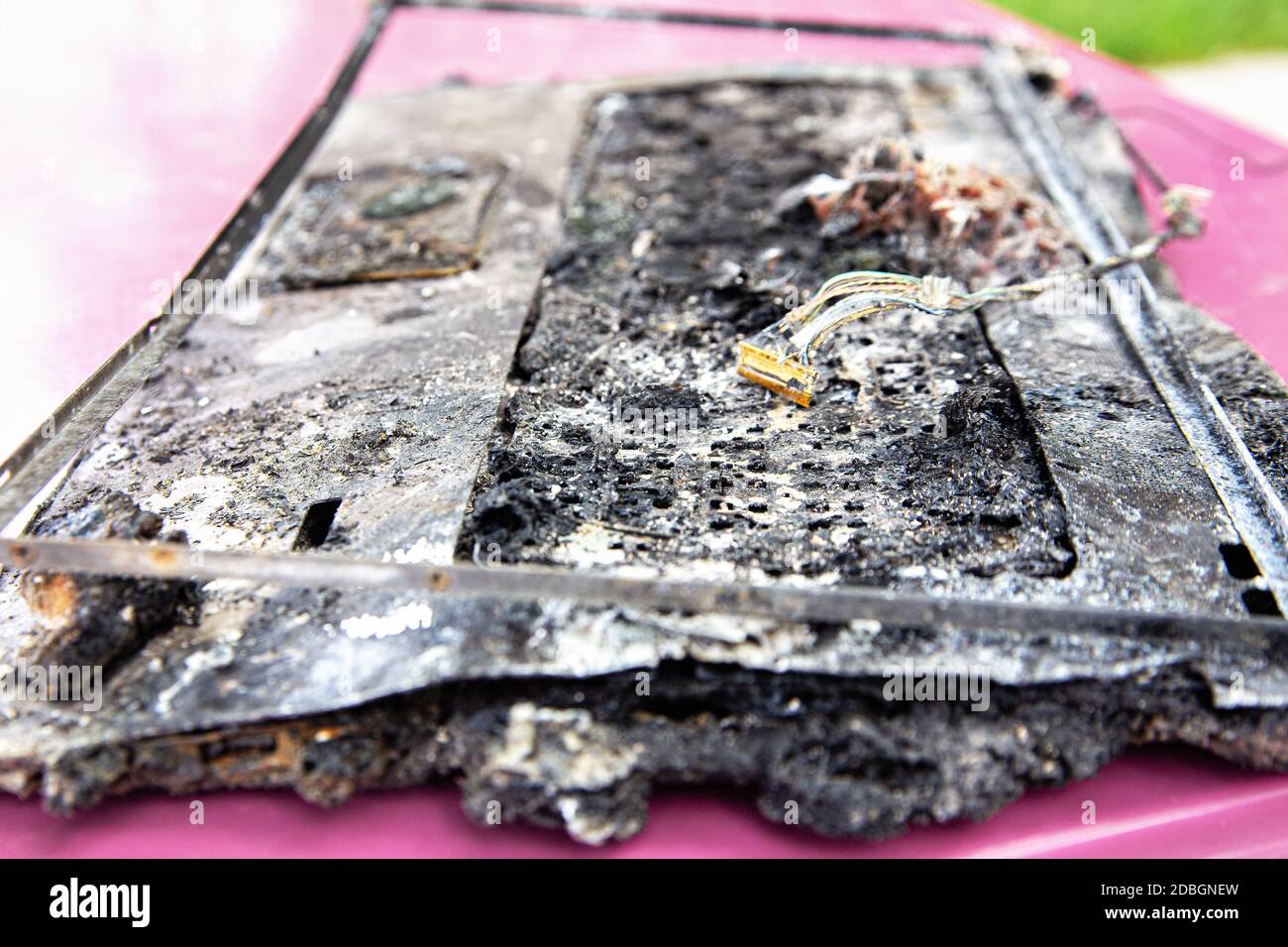 Computer Fire. Broken laptop computer spoiled by flame of hot fire ...
