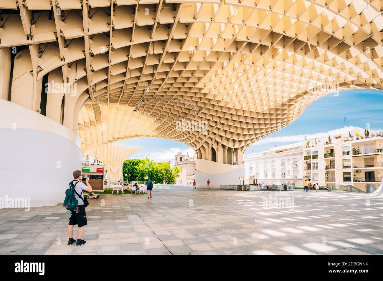 Seville, Spain. Tourist Taking Picture Of Metropol Parasol is a wooden ...