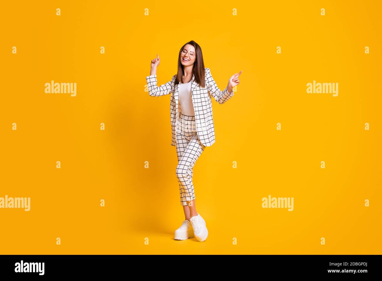 Full Length Body Size Photo Of Dancing Woman Wearing Round Eyeglasses Enjoying Music Isolated On