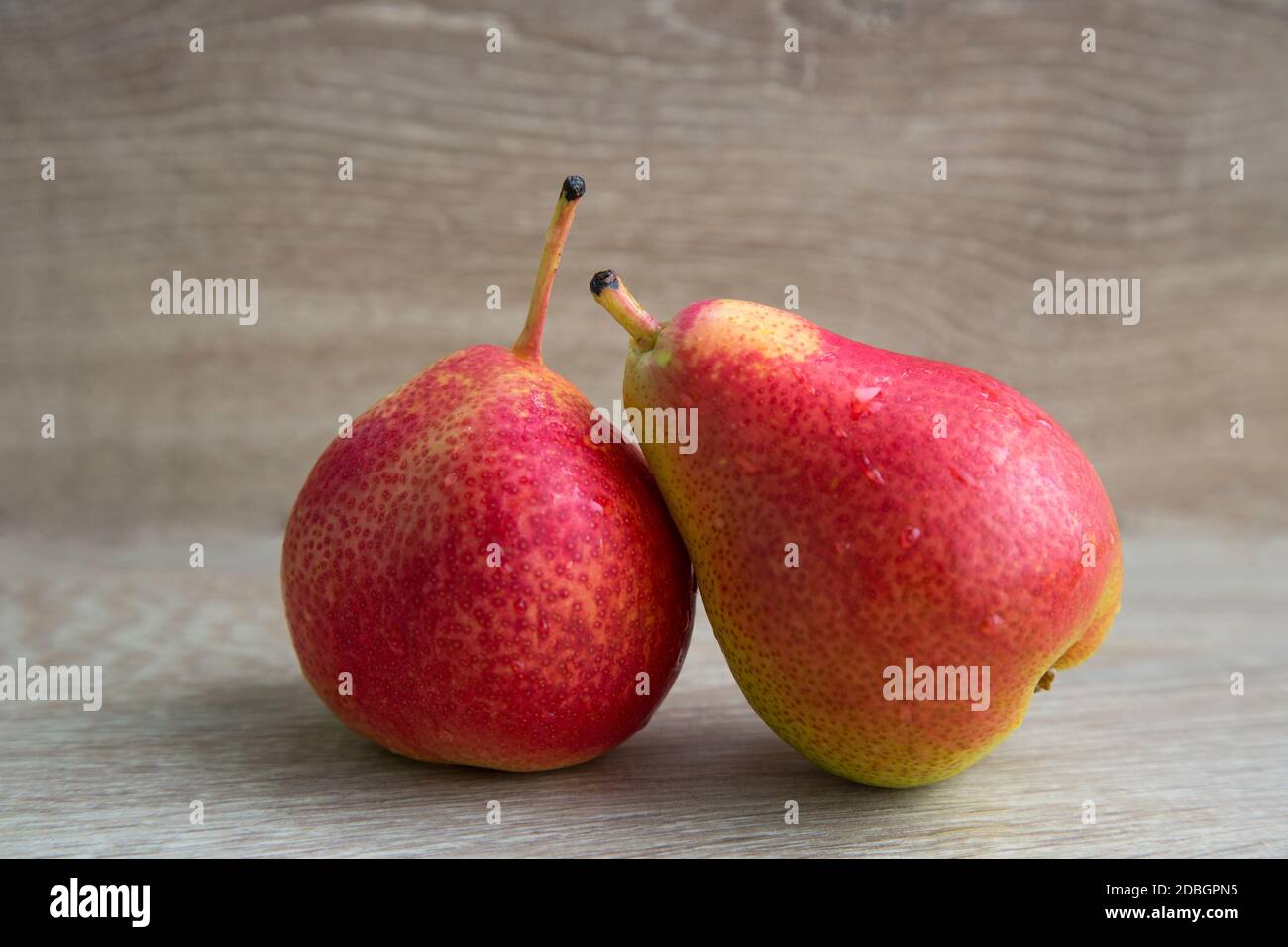 Fruits are ripe pears. Bio healthy food. Two red pears Stock Photo - Alamy