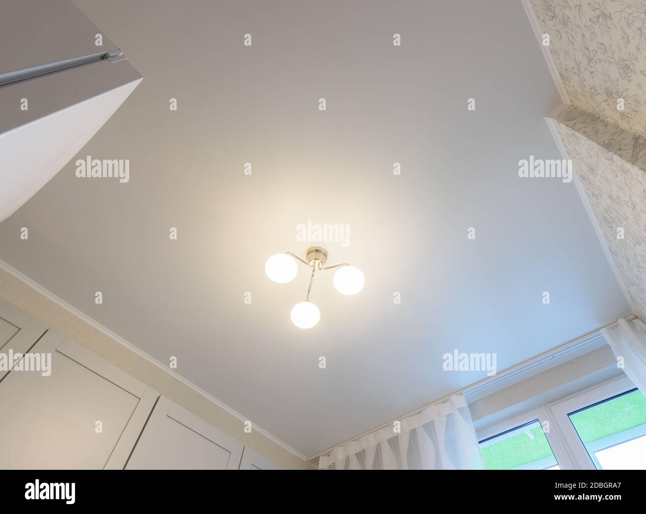 Stretch white matte ceiling in the interior of the kitchen Stock Photo ...