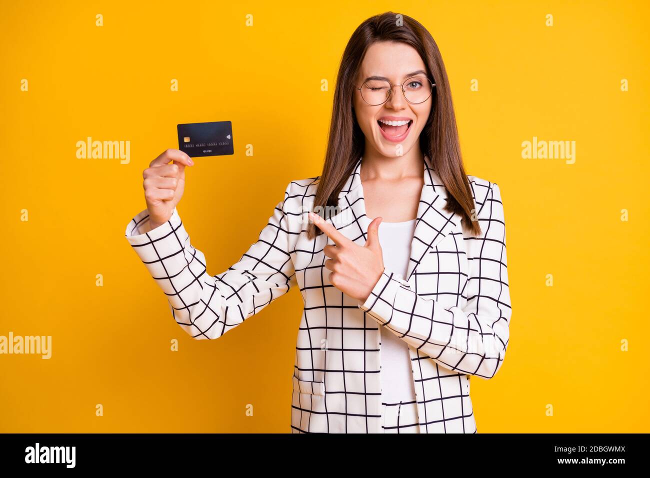 Photo portrait of young female worker pointing with finger at plastic ...