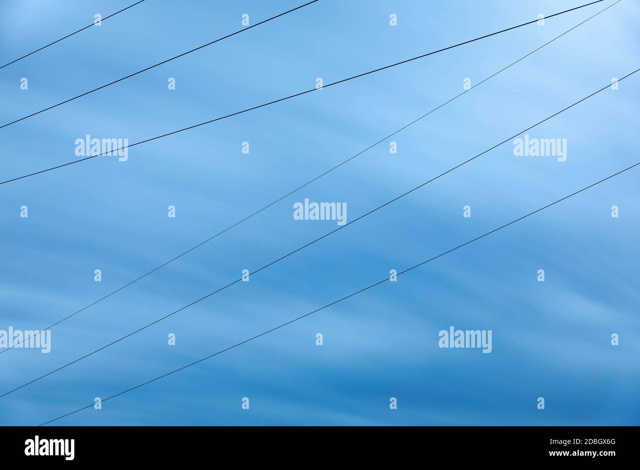 High voltage power line cables, shot with long exposure time Stock ...