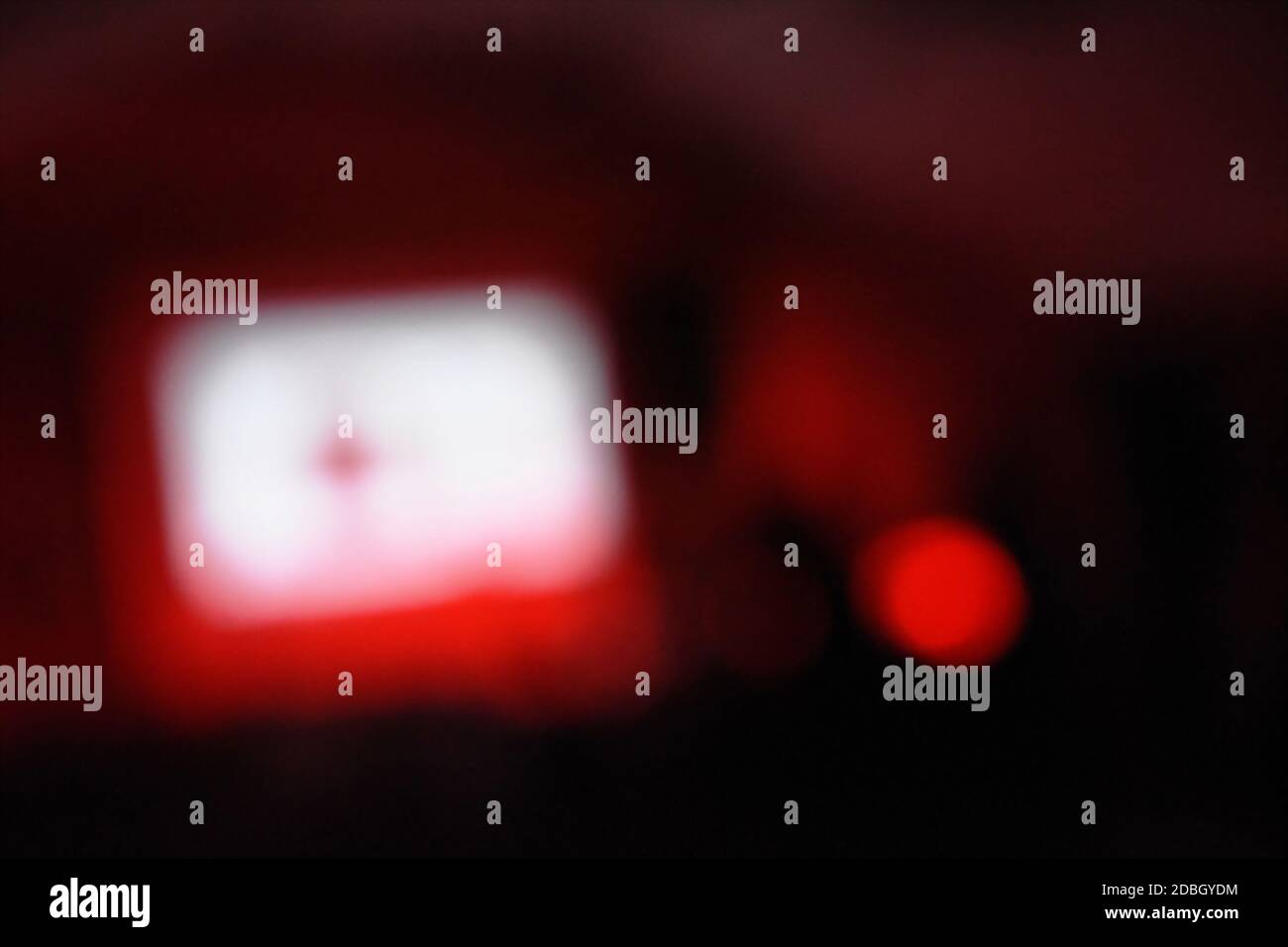 blurry computer screen in dark room background Stock Photo - Alamy