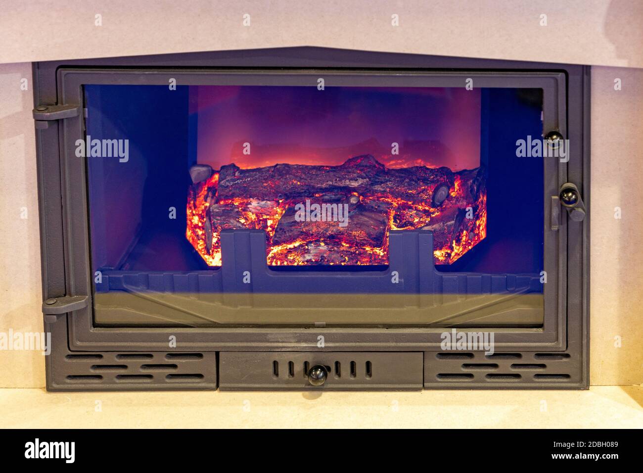 Electric Fireplace With Ceramic Wood Logs Fire Effects Stock Photo - Alamy