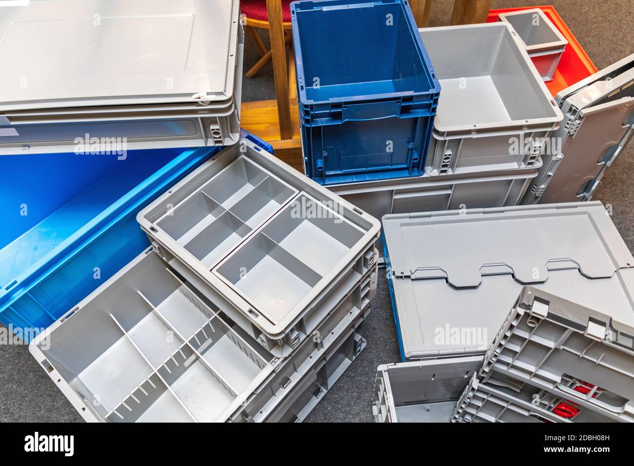 Many Plastic Transport Boxes and Crates Stock Photo - Alamy