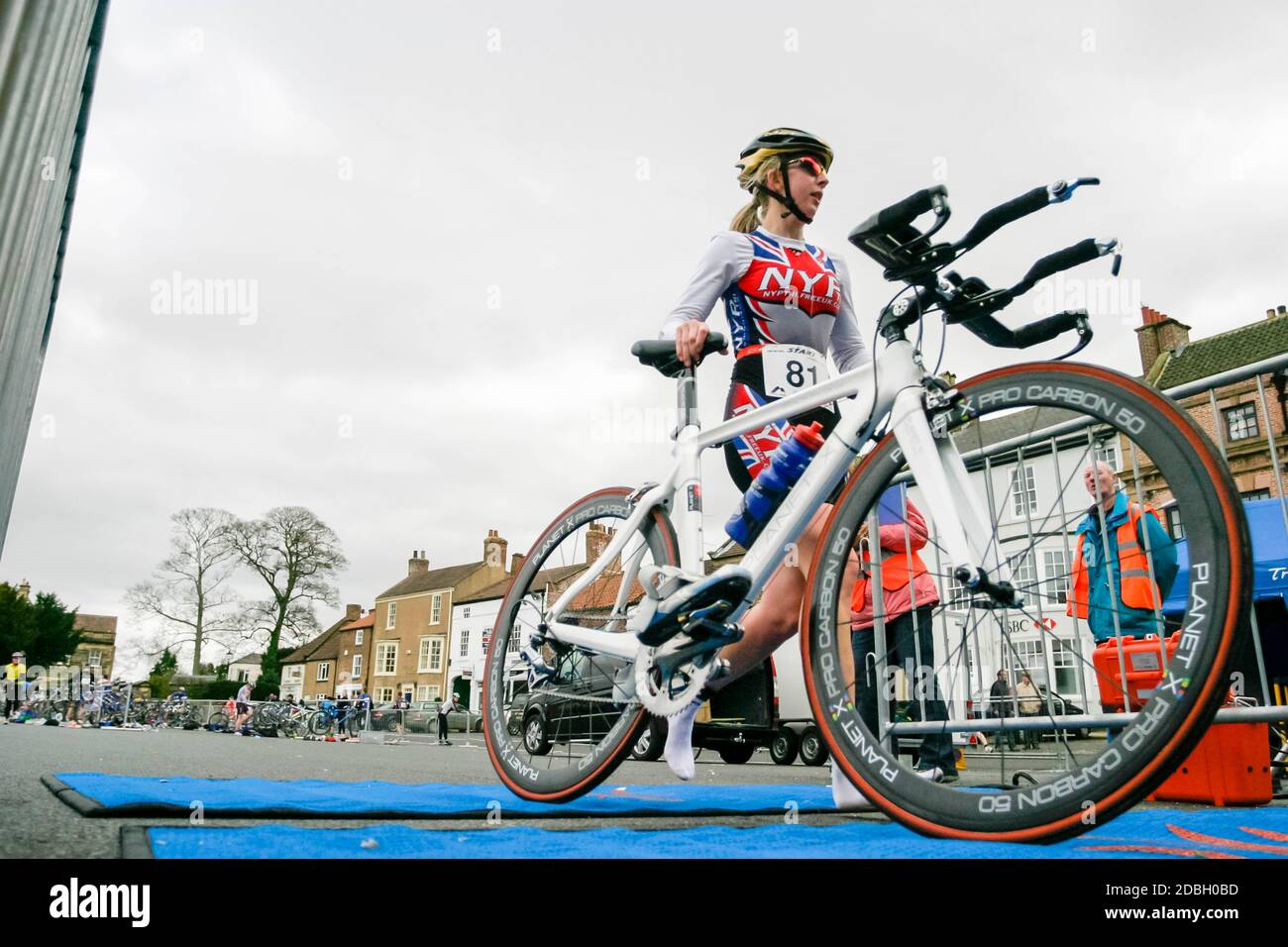 Competitors leaving the transition area for the cycle ride in the in ...