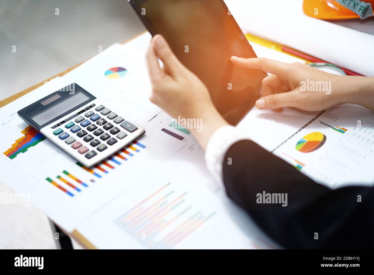 Accountant working project accounting with graph in modern office Stock ...