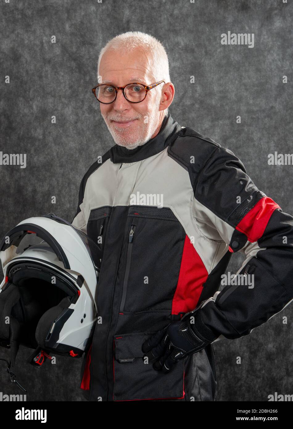 a portrait of senior biker with helmet Stock Photo - Alamy