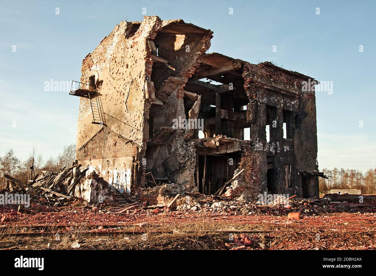 Landscape of ruined buildings at sunset, image of decrepitude or ...