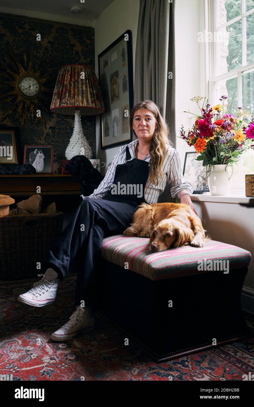 Interior designer Flora Soames and her dog Humbug, photographed at her ...