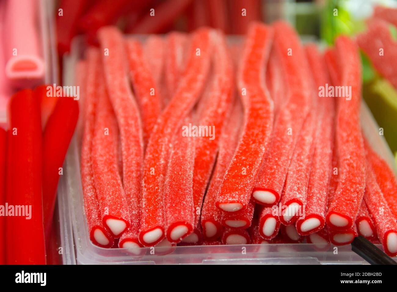 Red sour candy licorices. Sweet snack, gummies, jellybeans, gumdrop ...
