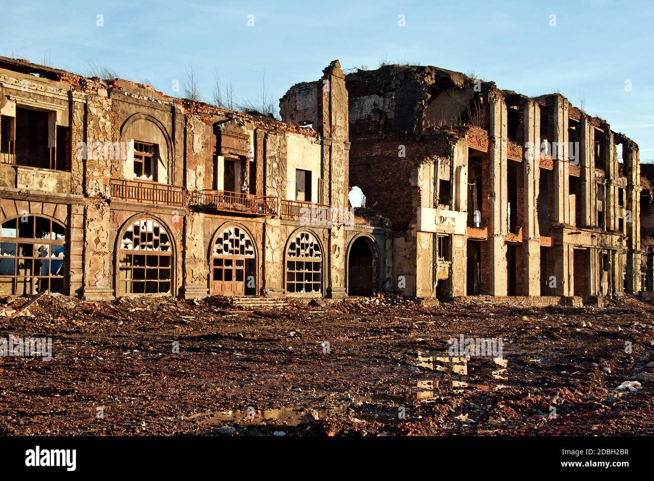 Landscape of ruined buildings at sunset, image of decrepitude or ...