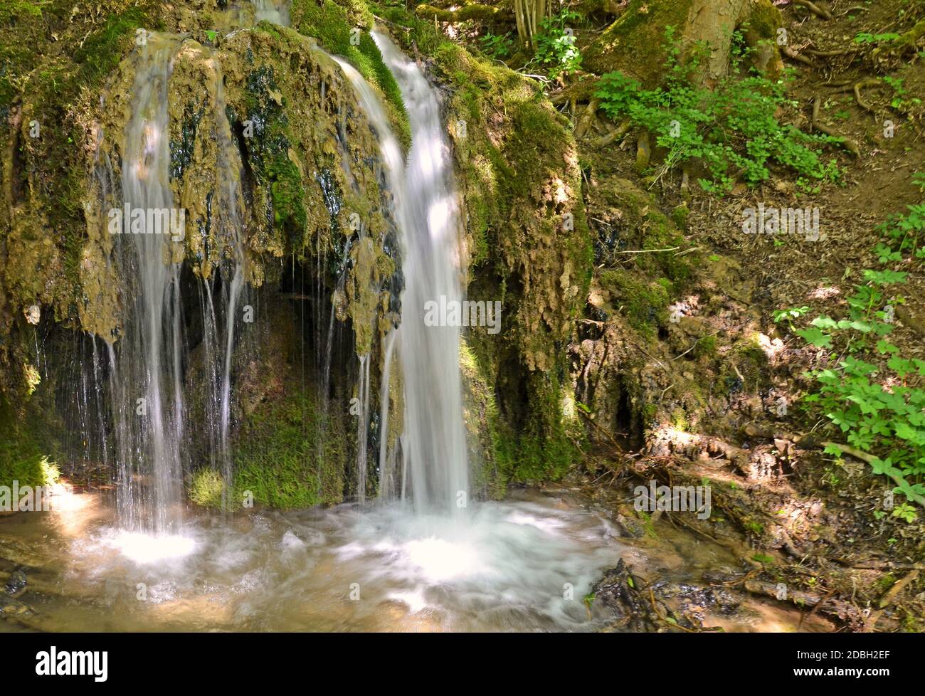 Small cave waterfall hi-res stock photography and images - Alamy