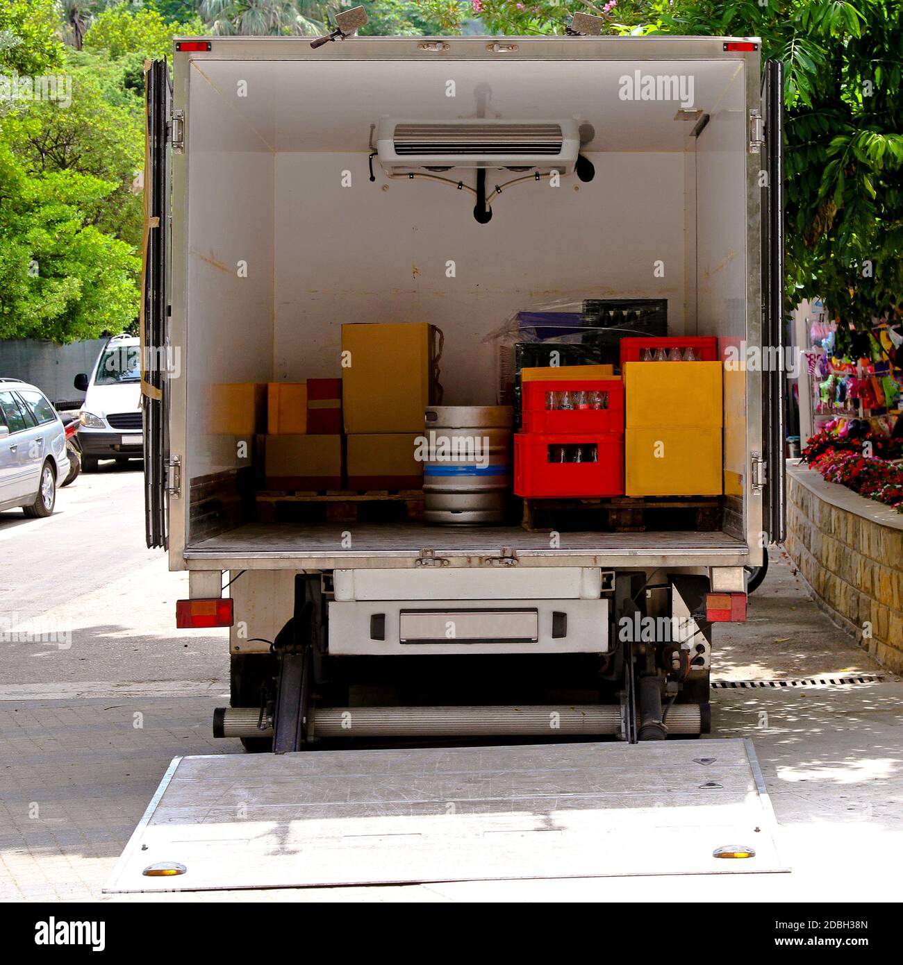 Commercial goods delivery truck with lift ramp Stock Photo - Alamy
