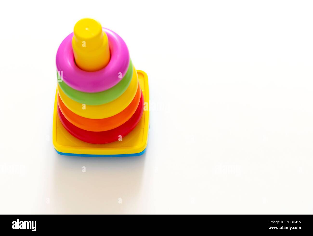 Colorful plastic ring tower for kids seen from above. Childhood and ...