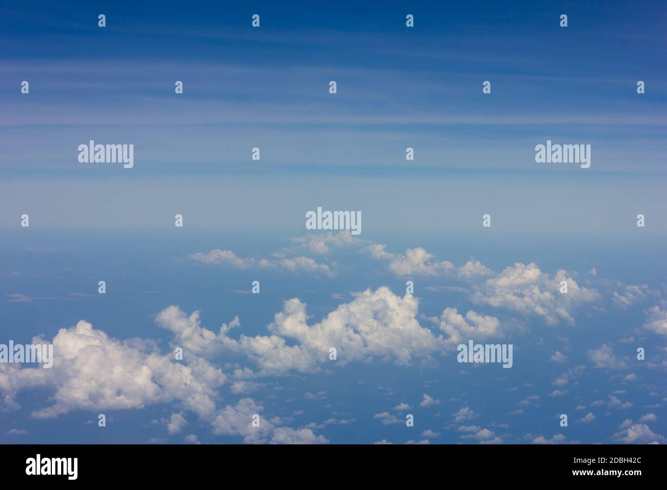 Sky and clouds bird's eye view on the plane Stock Photo - Alamy