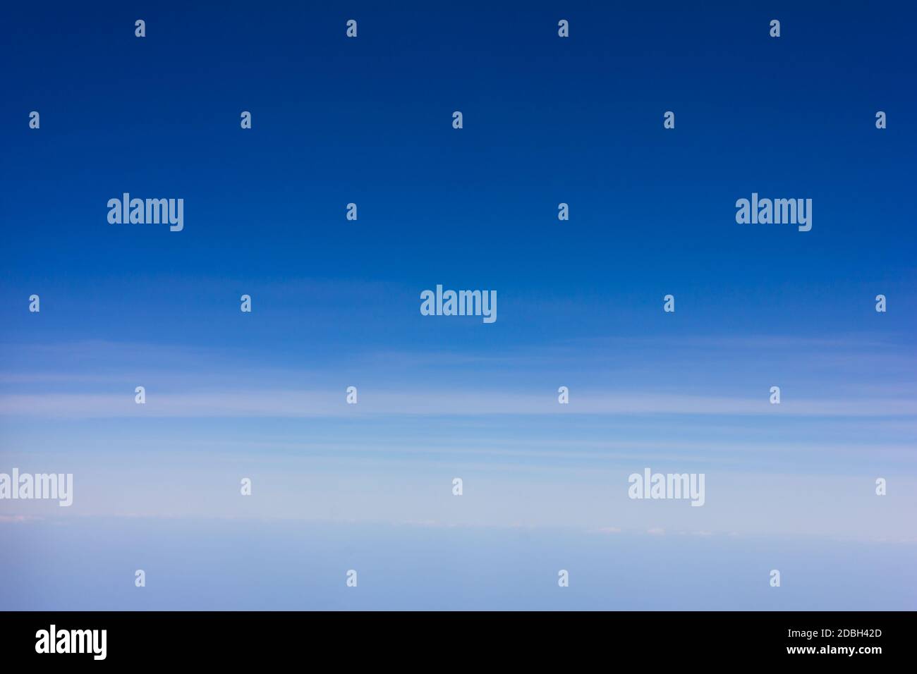 Sky and clouds bird's eye view on the plane Stock Photo - Alamy