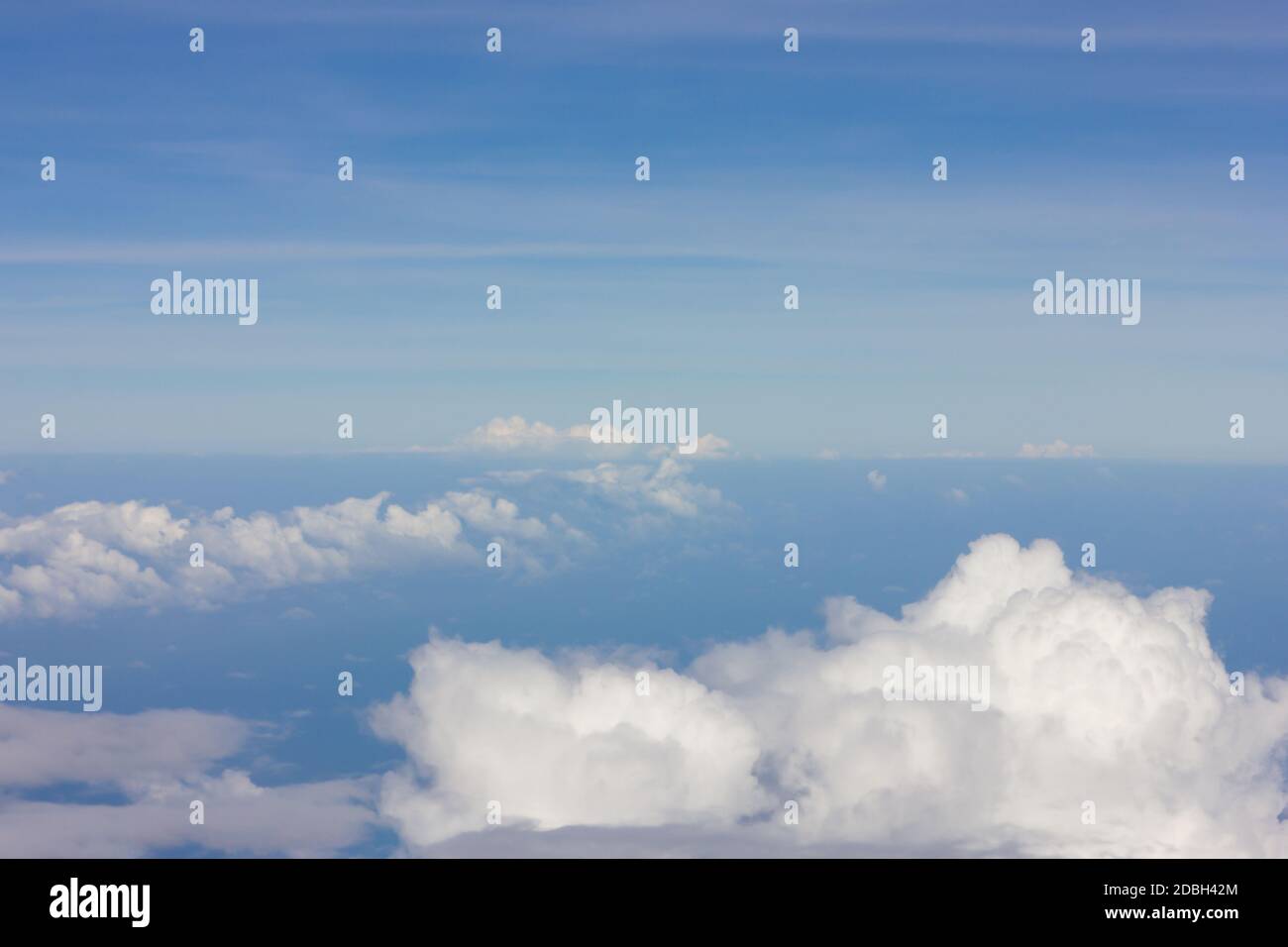 Sky and clouds bird's eye view on the plane Stock Photo - Alamy