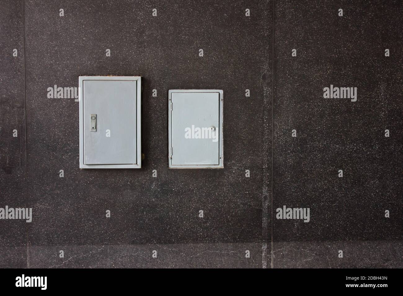 still cabinet service on the black wall Stock Photo - Alamy