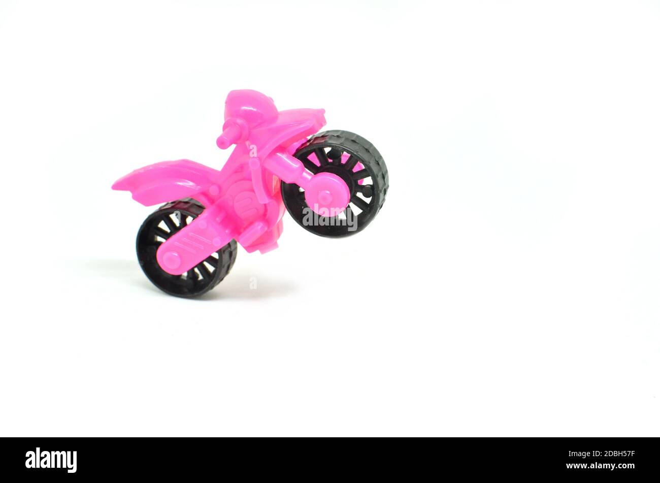 Small Pink Toy motorcycle isolated on white background Stock Photo - Alamy