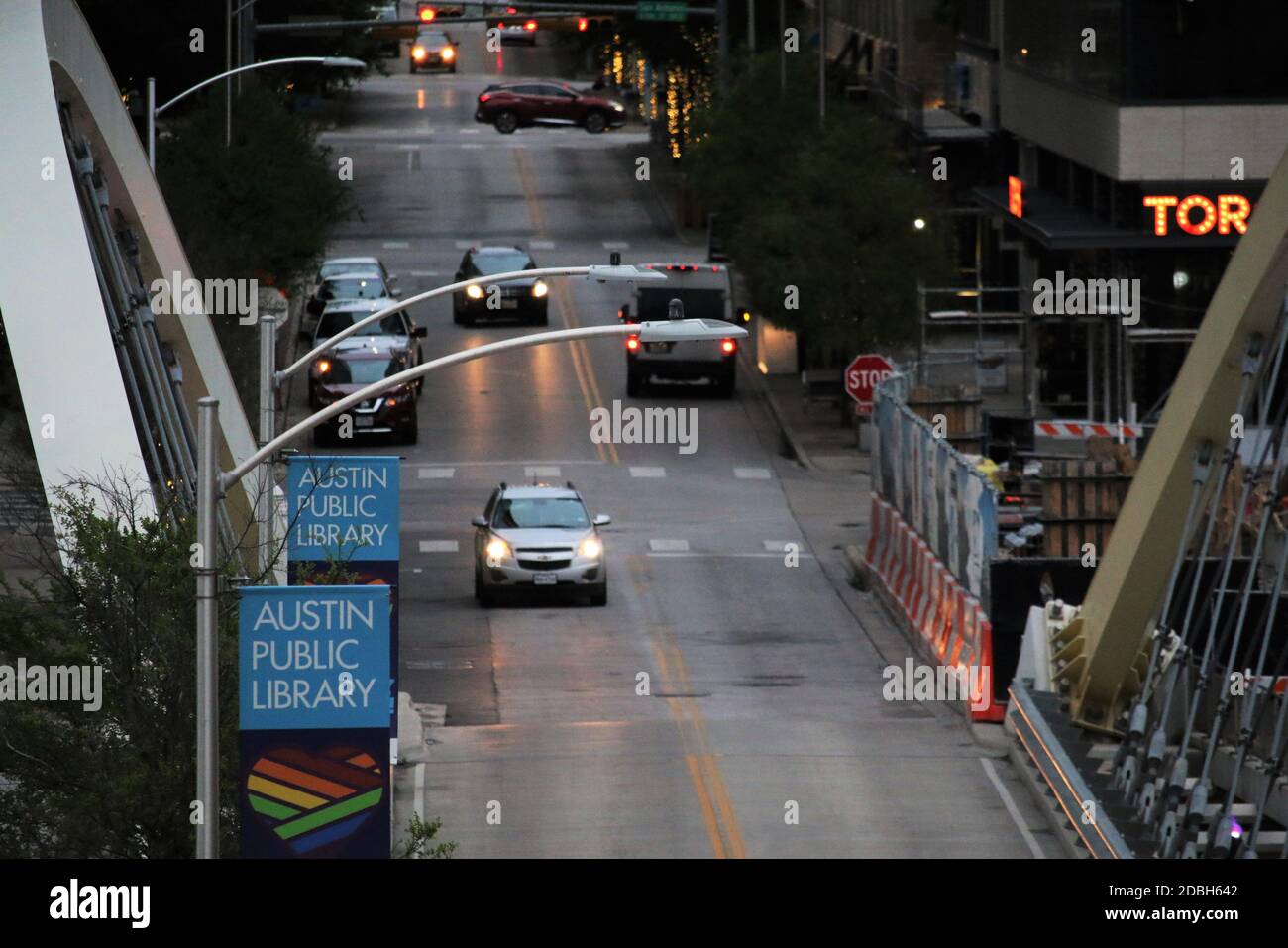 Cars driving towards the Austin Library Stock Photo - Alamy