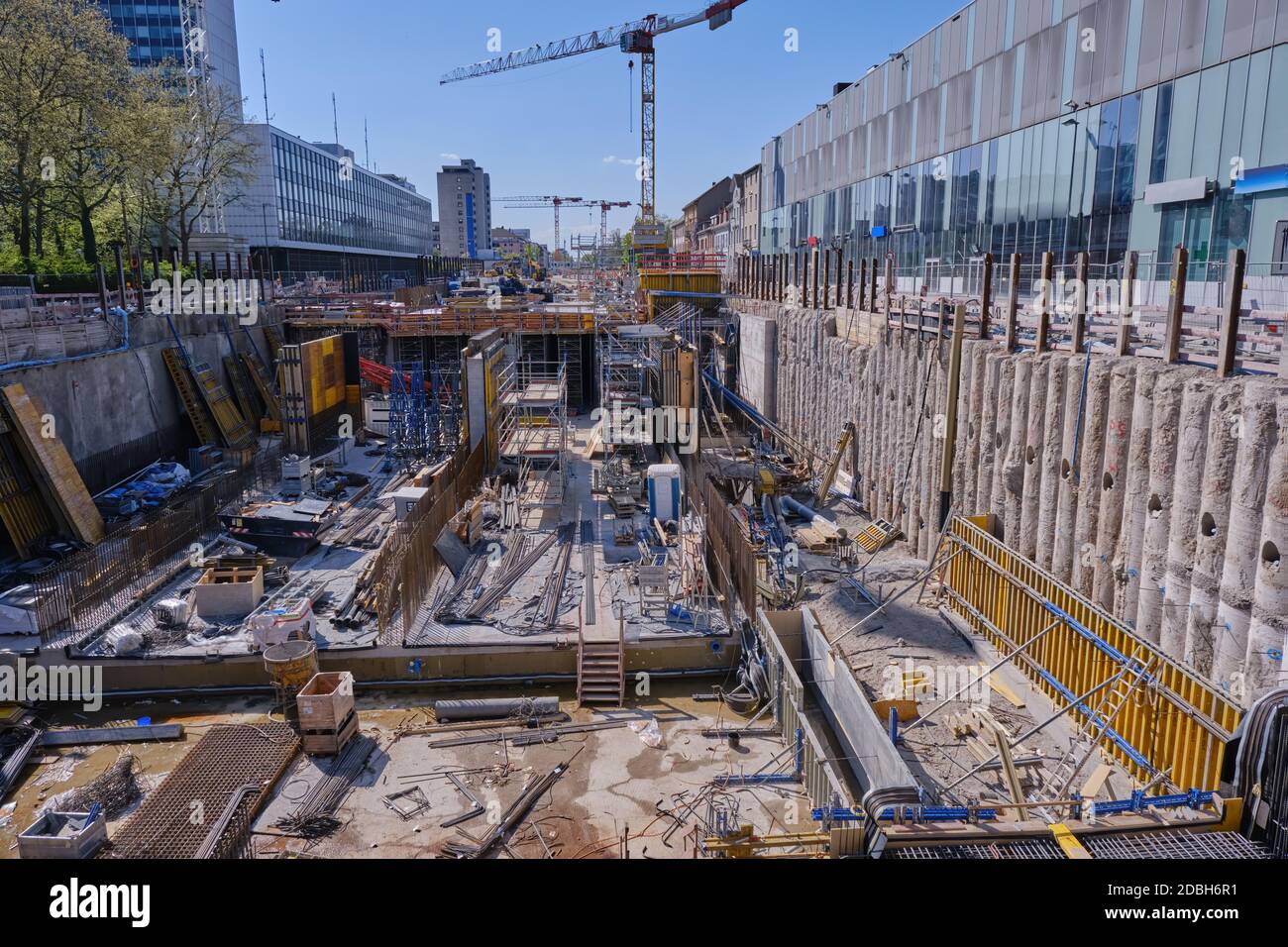 Large construction site for a subway, construction machinery ...