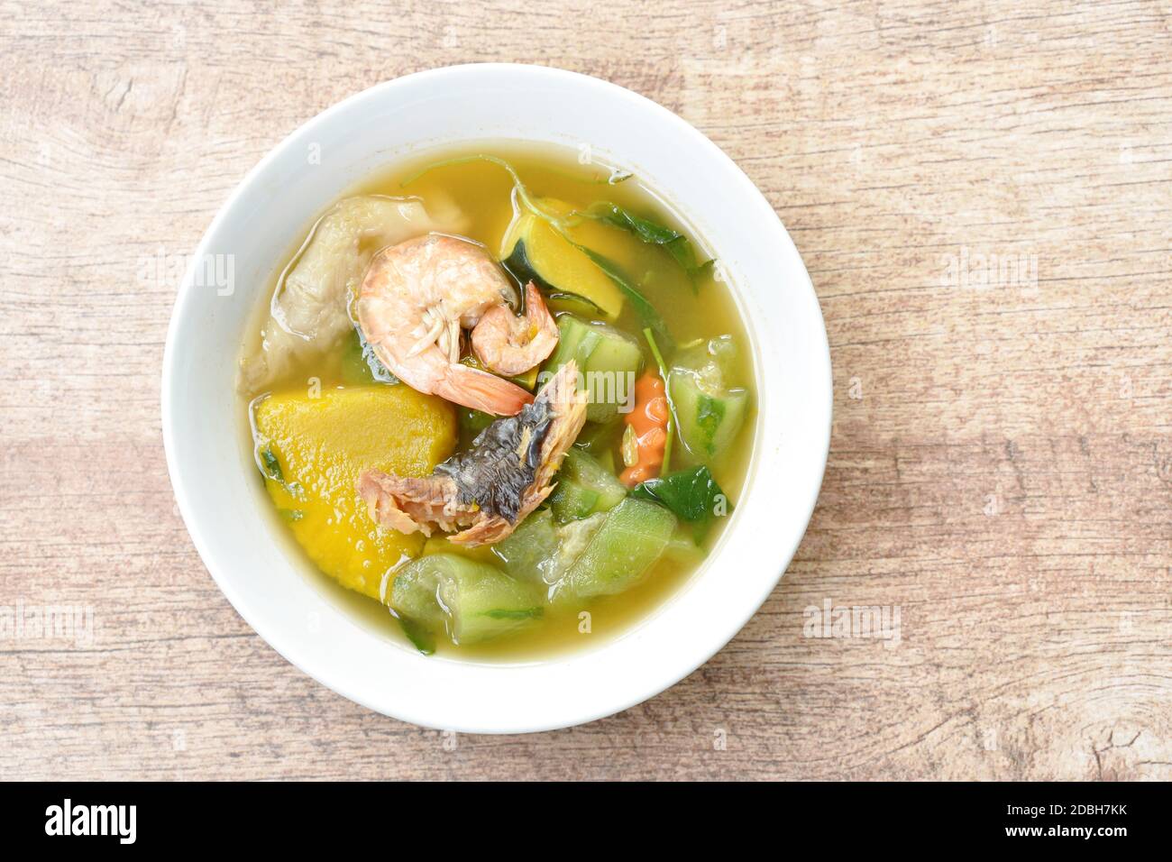 Boiled spicy mixed vegetable with shrimp and smoked dry fish soup on ...