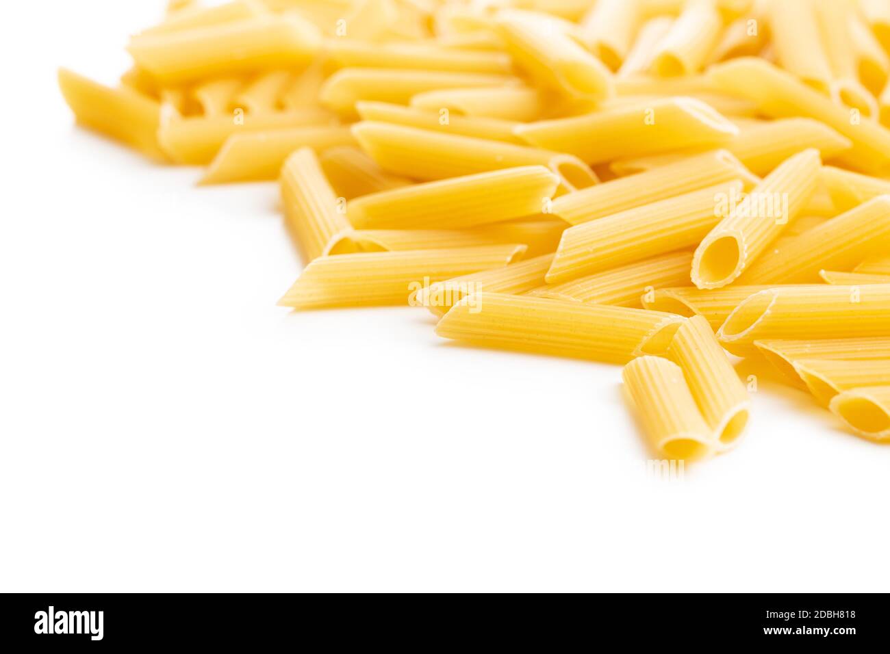 Uncooked penne pasta. Dried italian pasta isolated on white background ...