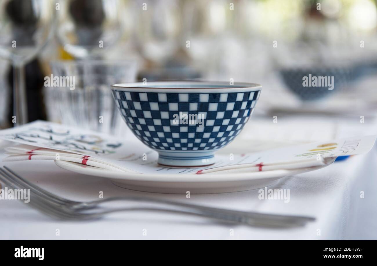 Interior of dining room set up for dinner Stock Photo - Alamy
